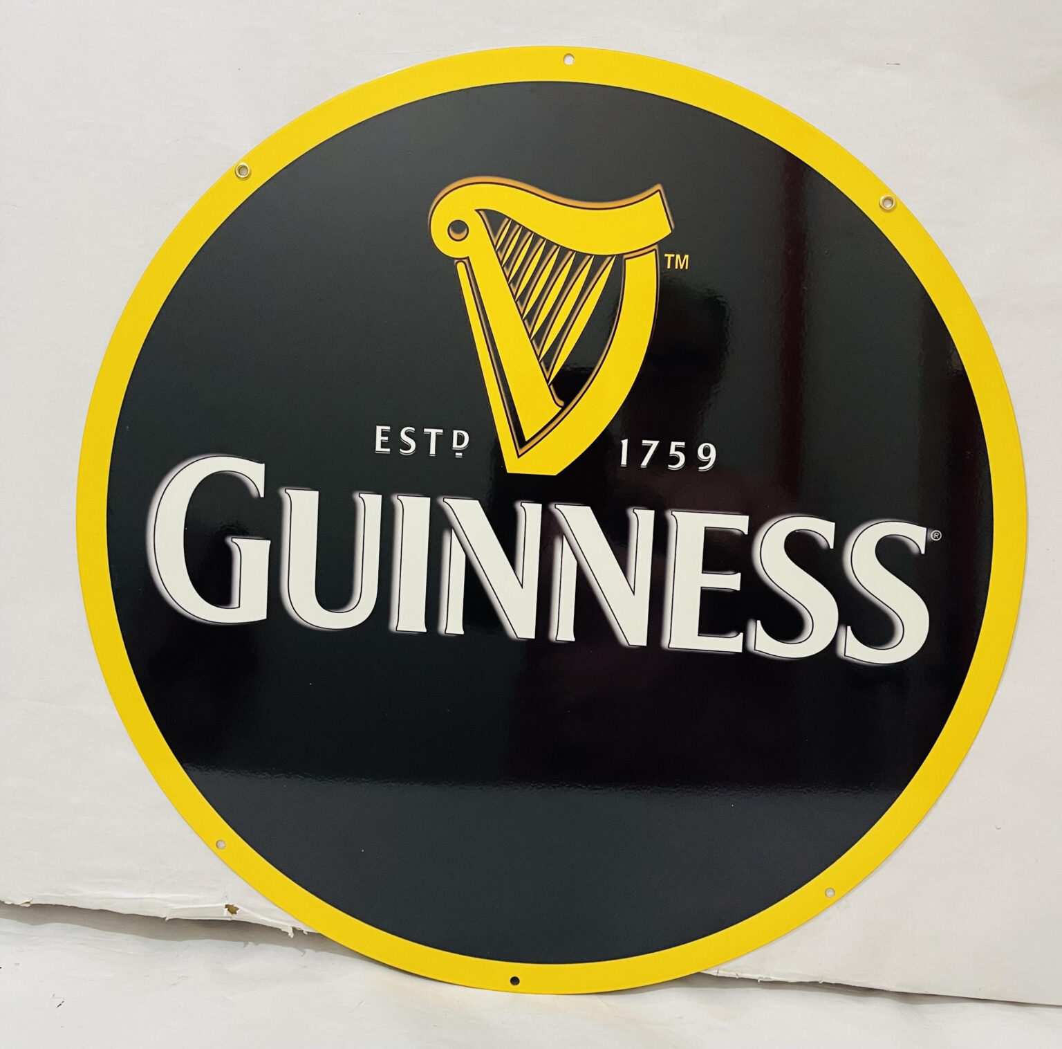 Guinness round tin metal sign - Nostalgia Highway